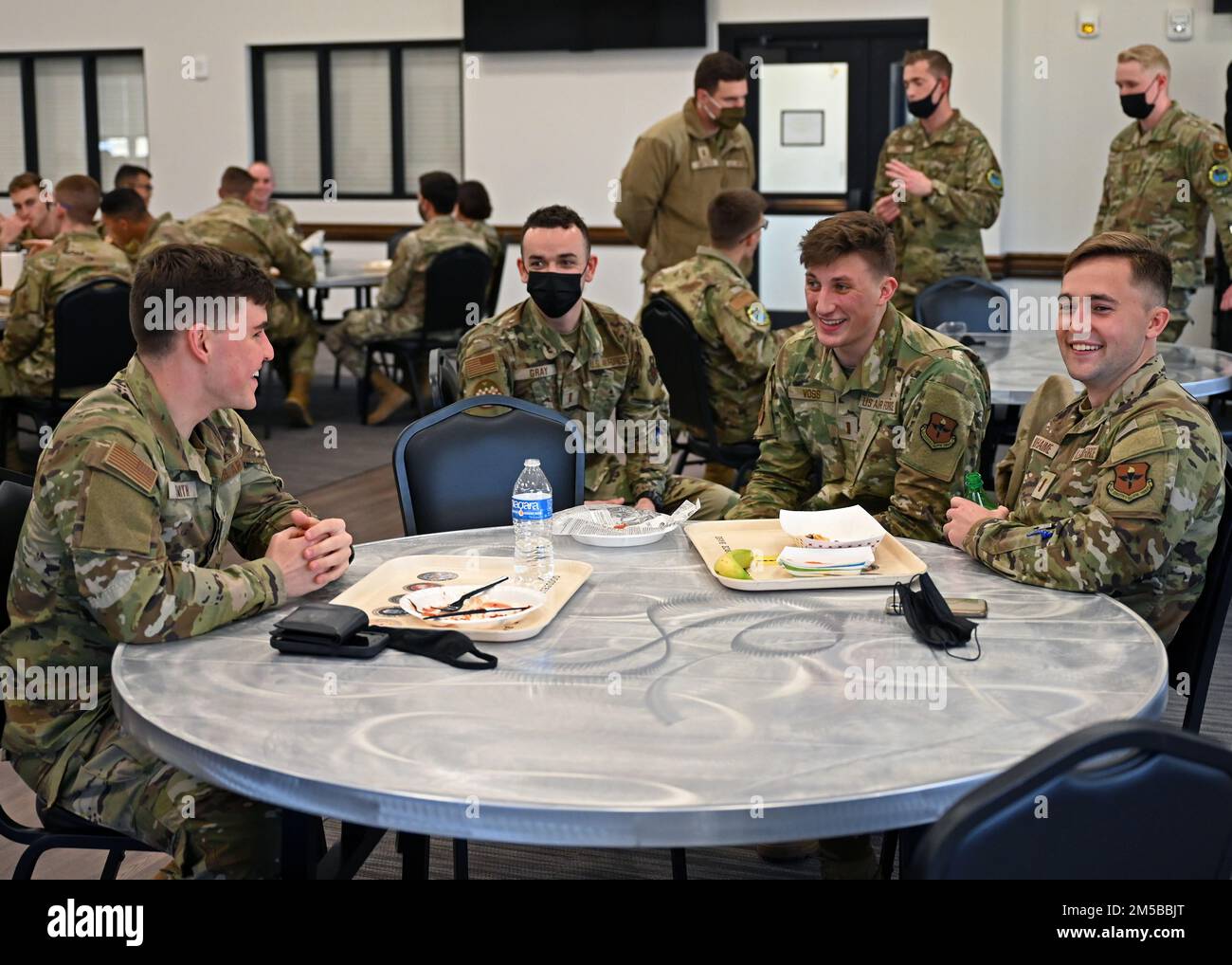 A Texas A&M University cadet, left, talks with 17th Training Wing ...