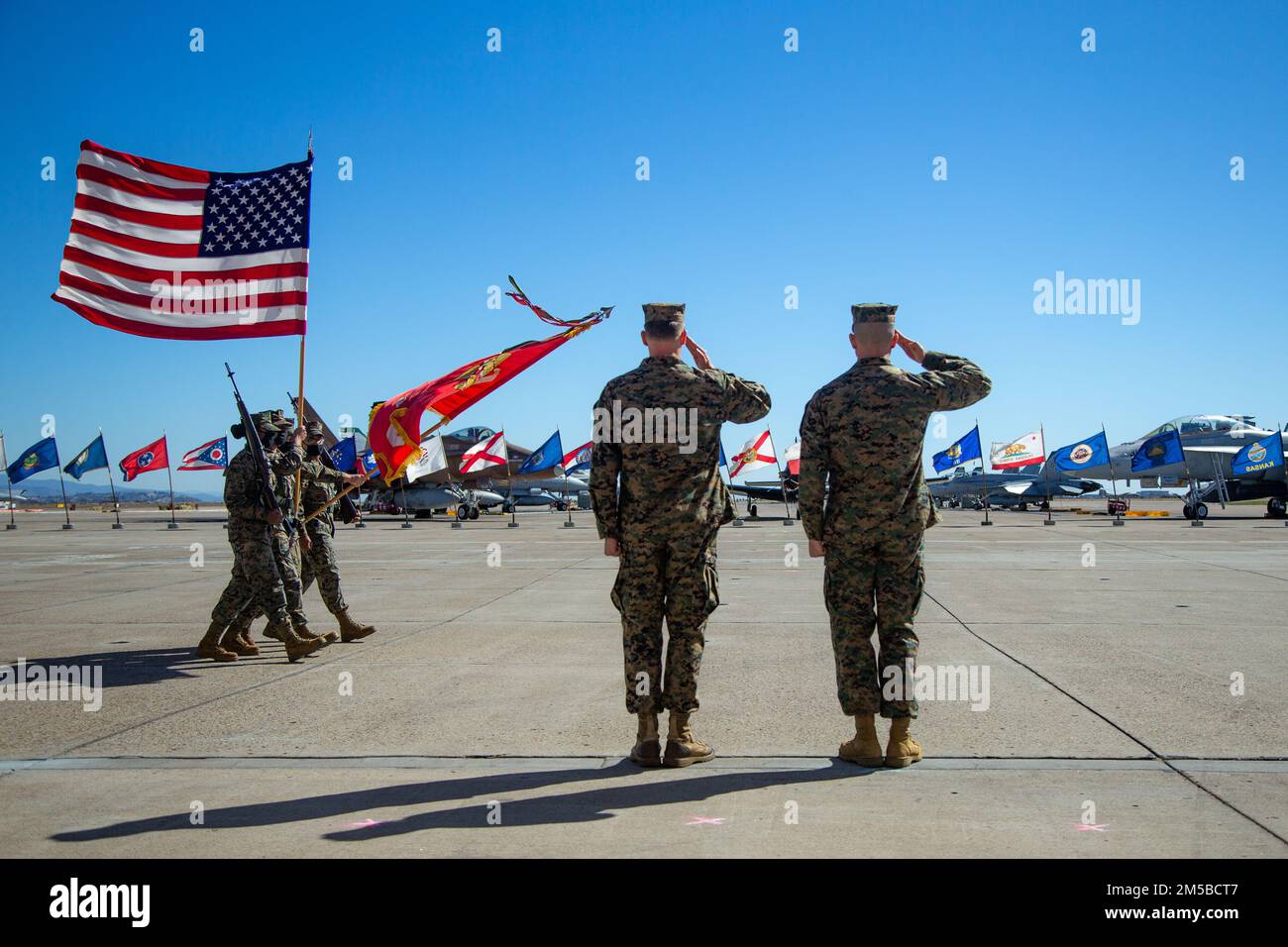 U.S. Marine Corps Col. Nathan M. Miller, right, outgoing commanding officer of Marine Fighter ...
