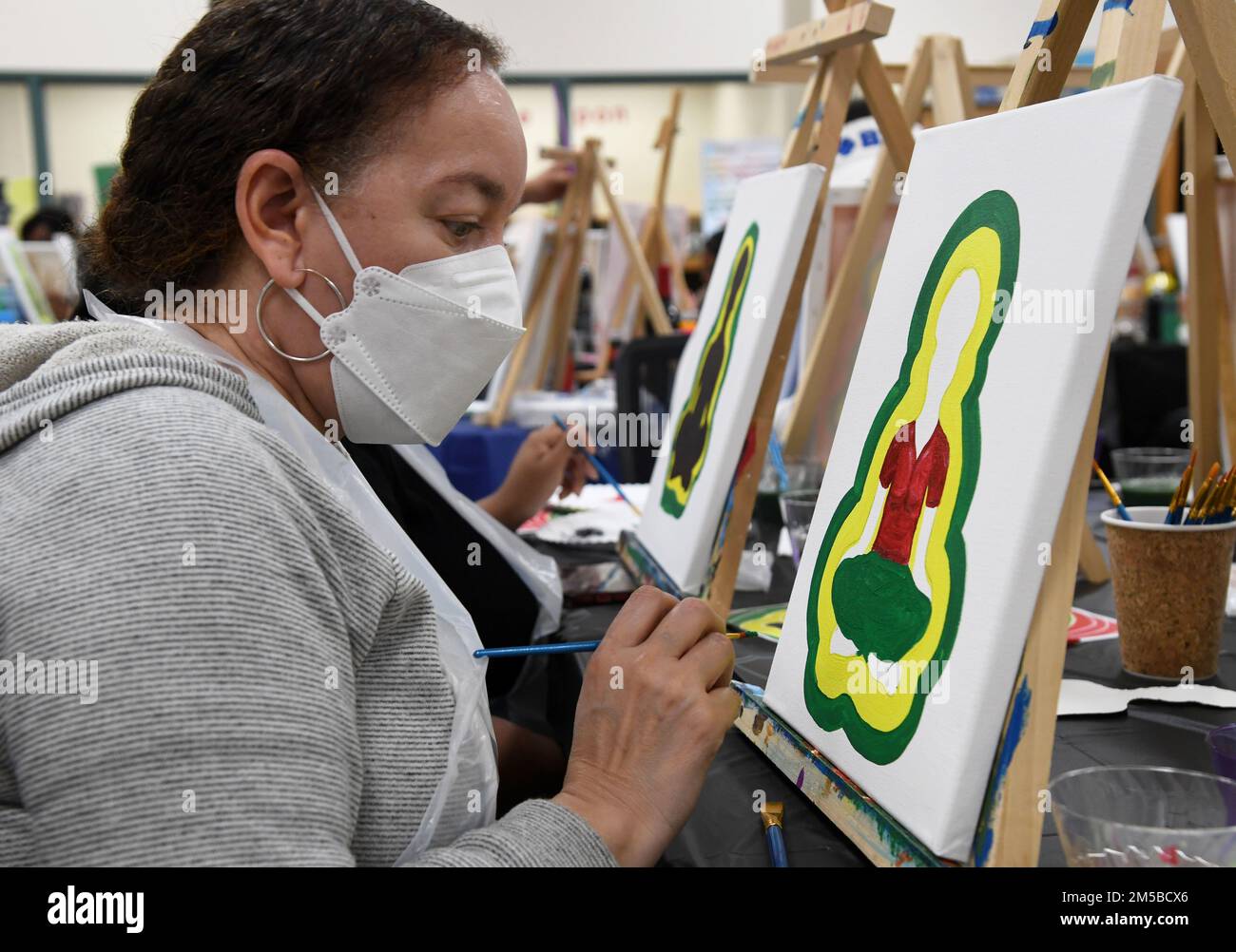 Retired U.S. Air Force Tech. Sgt. Angela Greer participates in a paint ...