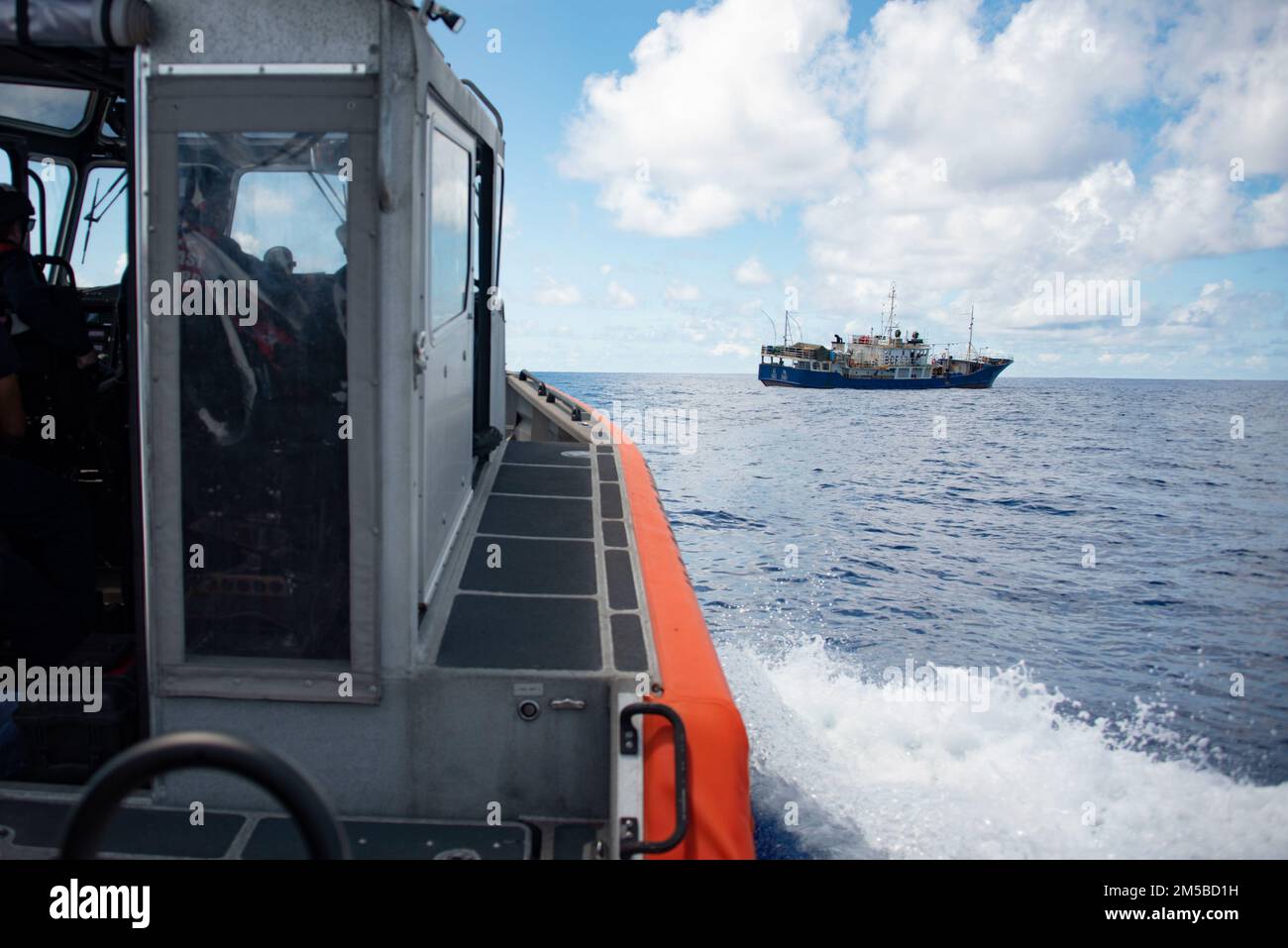 U.S. Coast Guard crew members assigned to the USCGC Stratton (WMSL 752 ...