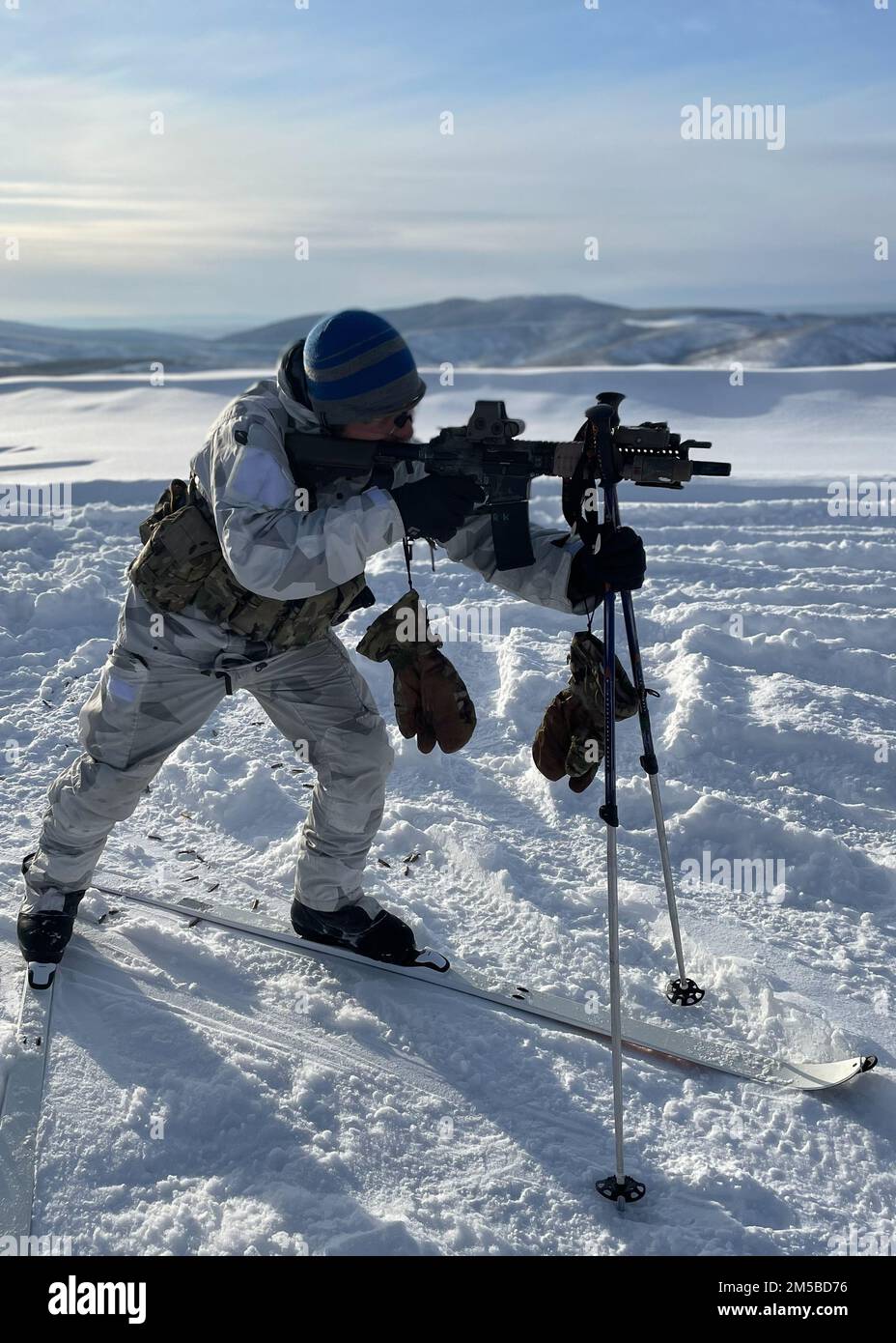 A Green Beret assigned to 10th Special Forces Group (Airborne) fires an ...