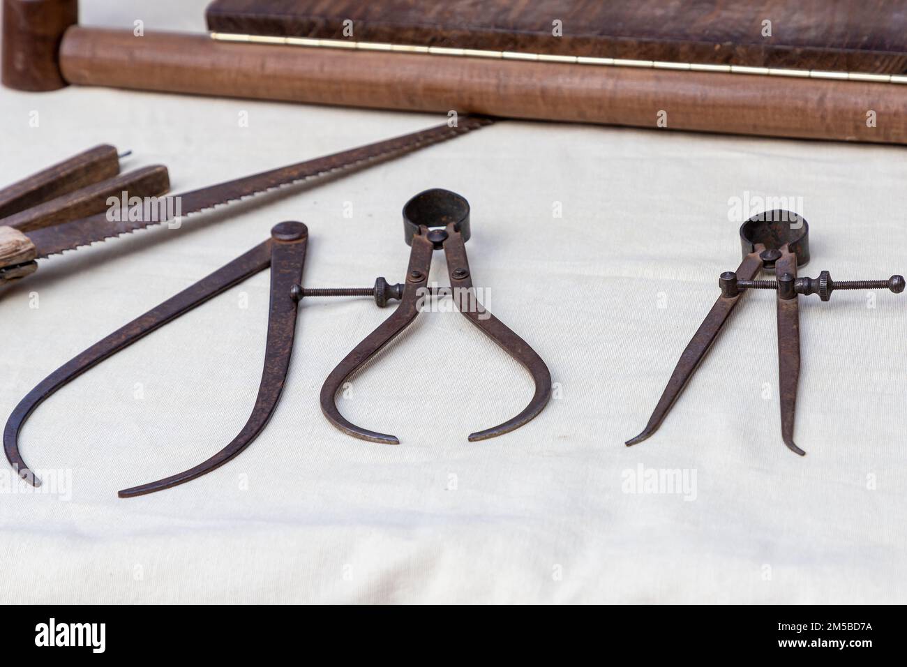closeup in horizontal view of three craftsman carpenter compasses Stock ...