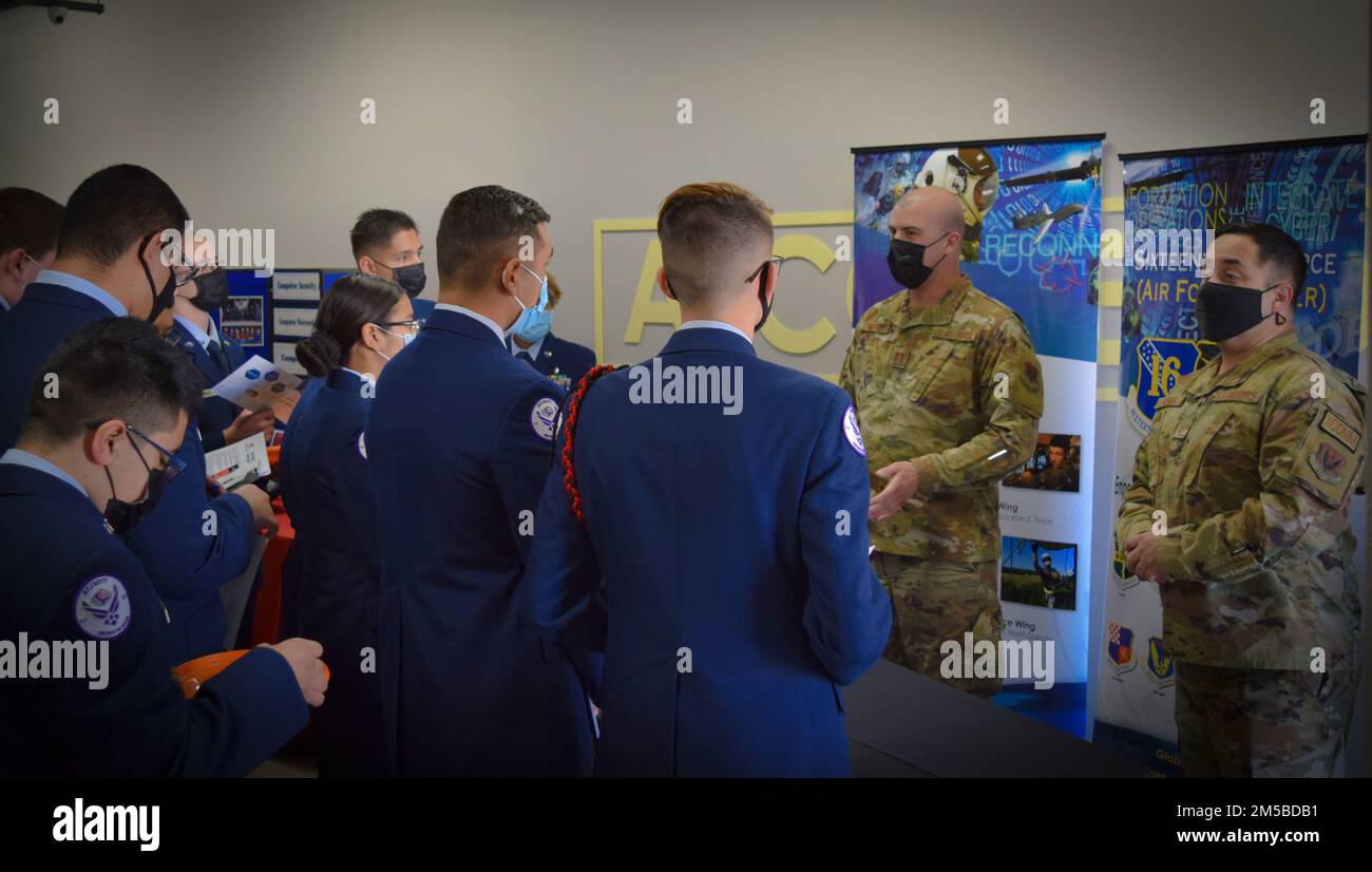 Capt. Robert Compton and Master Sgt. Cornelio Flores III, talk with ...