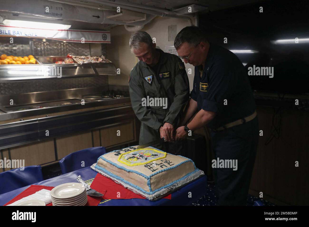 PACIFIC OCEAN (Feb. 20, 2022) Rear Adm. Jeffrey Anderson, left ...