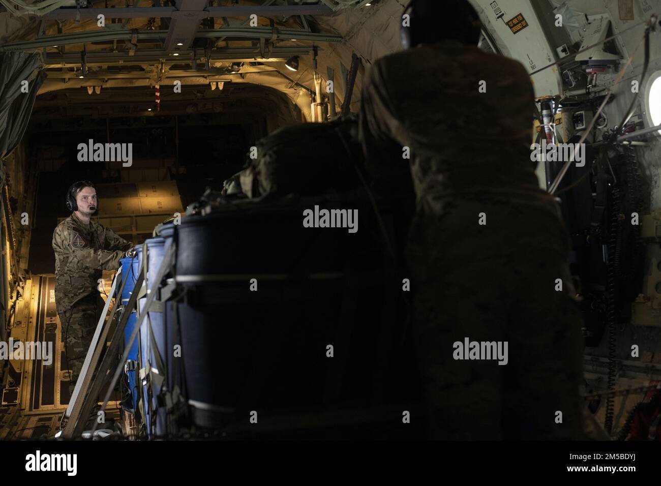Tech Sgt. Wesley Zech, background, and Staff Sgt. McArthur Posey ...