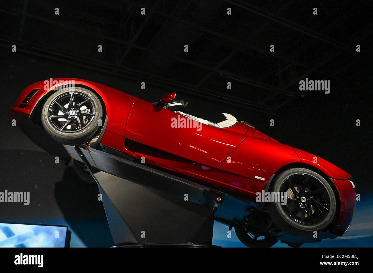 A Tesla Roadster sits on display at the Petersen Automotive Museum ...