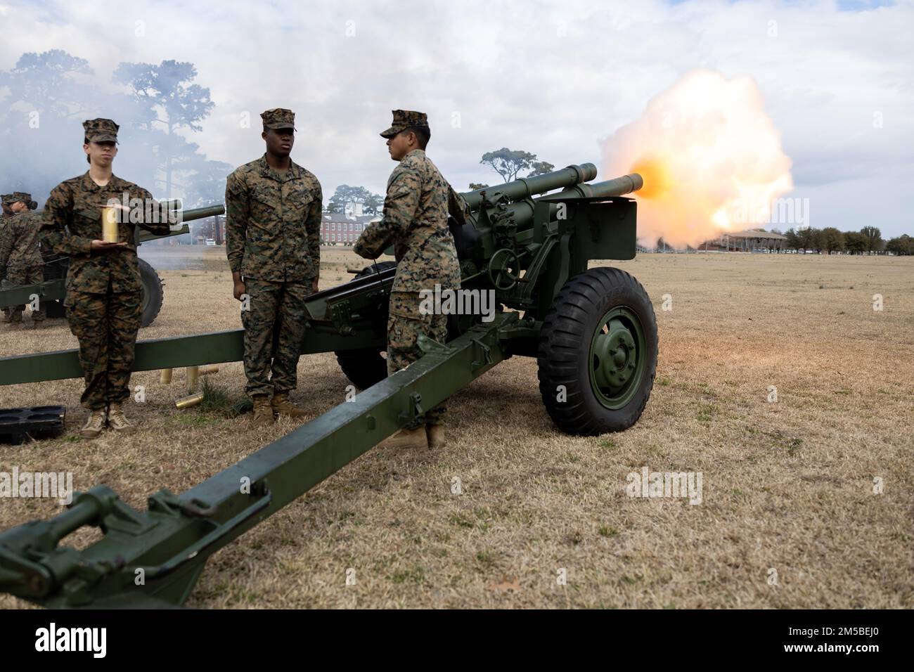 U.S. Marines with Kilo Battery, 2d Battalion, 10th Marines, fire a ...