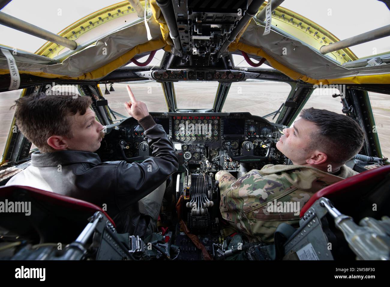 A U.S. Air Force B-52H Stratofortress pilot, left, assigned to the 69th ...