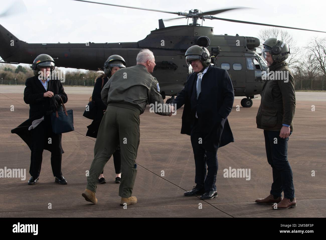 U.S. Air Force Col. Charles Metrolis, center left, U.S. Embassy U.S ...