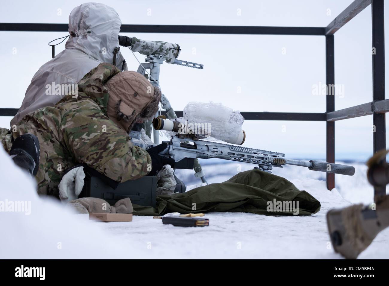 A Special Forces sniper team assigned to 10th Special Forces Group ...
