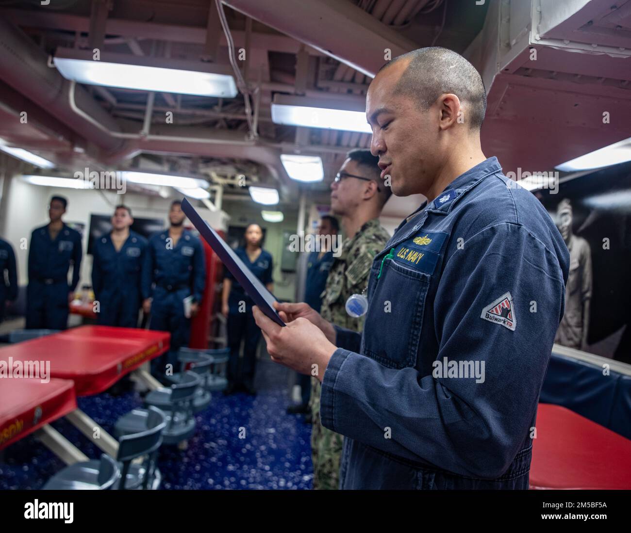 SOUTH CHINA SEA (Feb. 21, 2022) Cmdr. Isaia Infante, from Bremerton ...