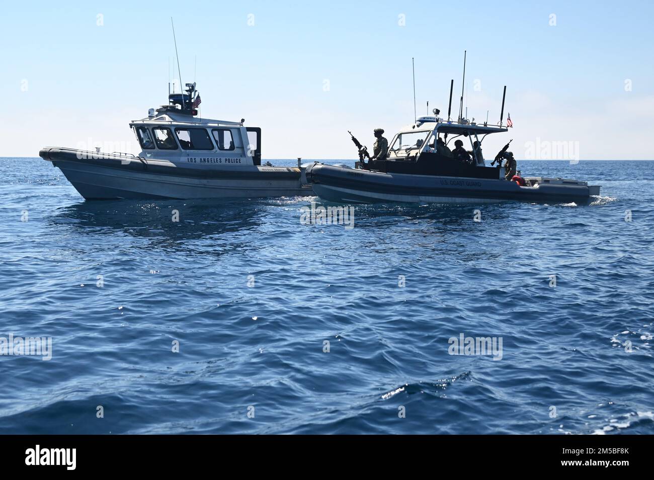 U.S. Coast Guard Port Security Unit (PSU) 311 members, aboard a 32-foot ...