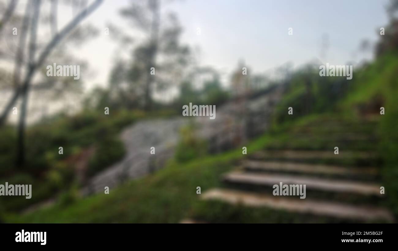 blurred stairs, green grass and sulfur rocks in a tourist spot Stock ...