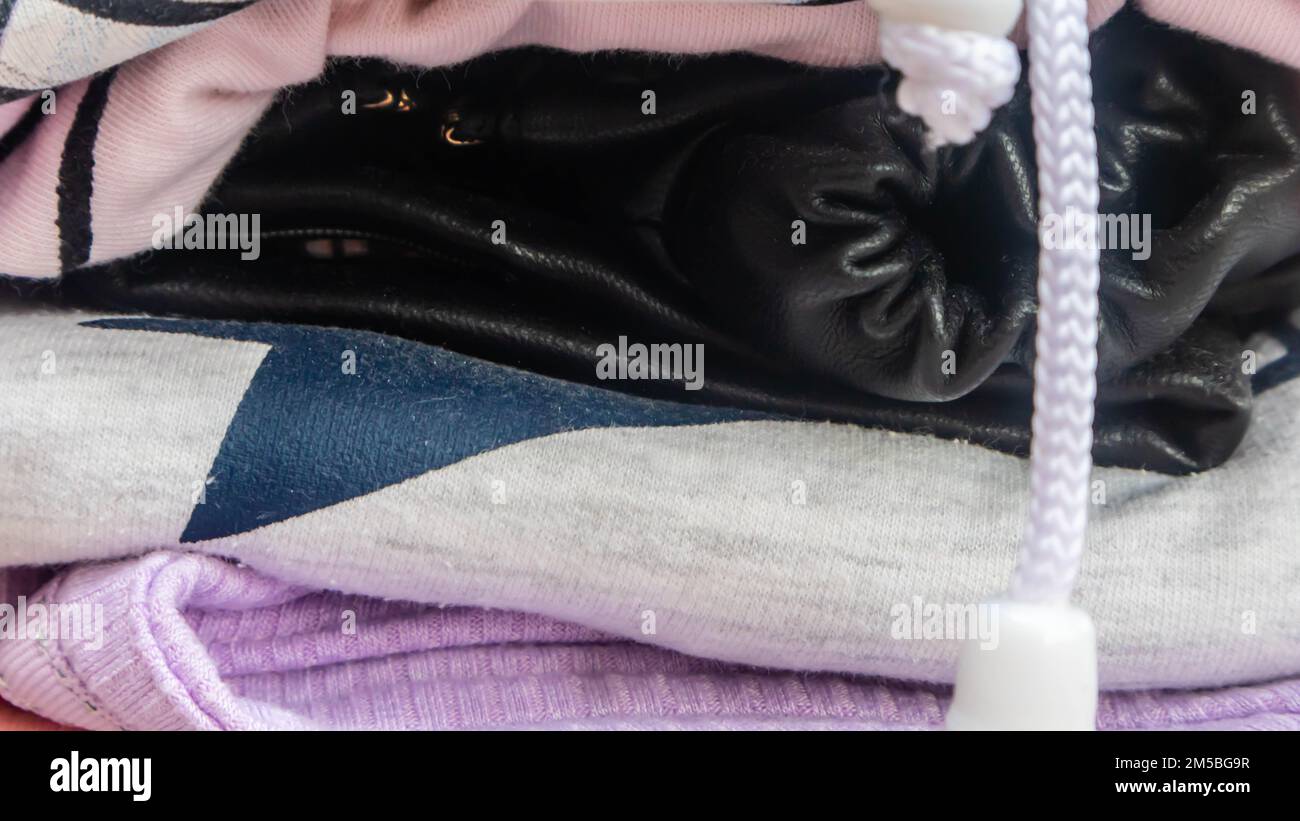 pile of clothes as background Stock Photo - Alamy