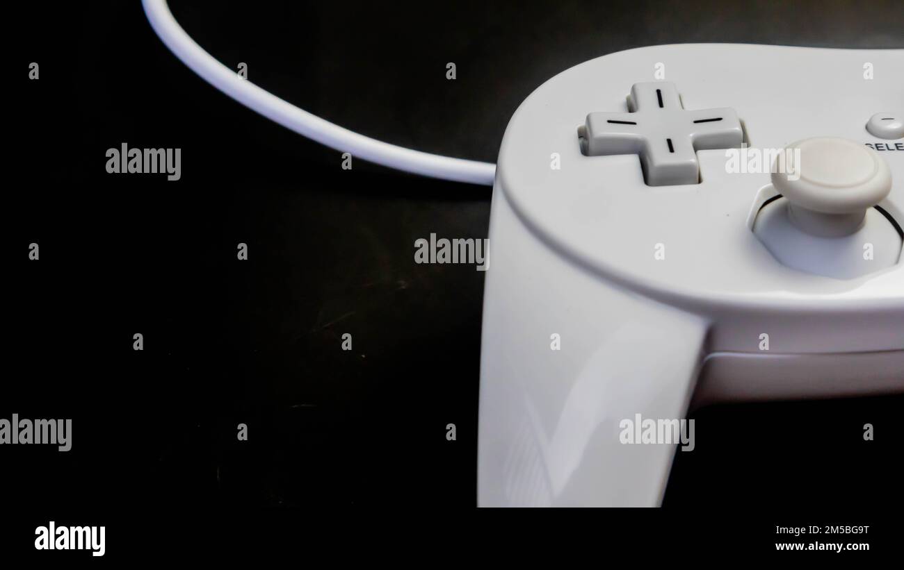 white joystick isolated on black background Stock Photo - Alamy
