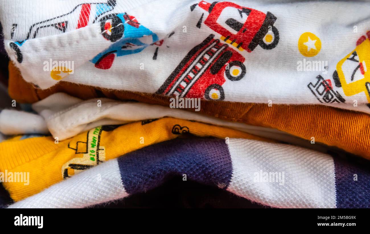 pile of clothes as background Stock Photo - Alamy