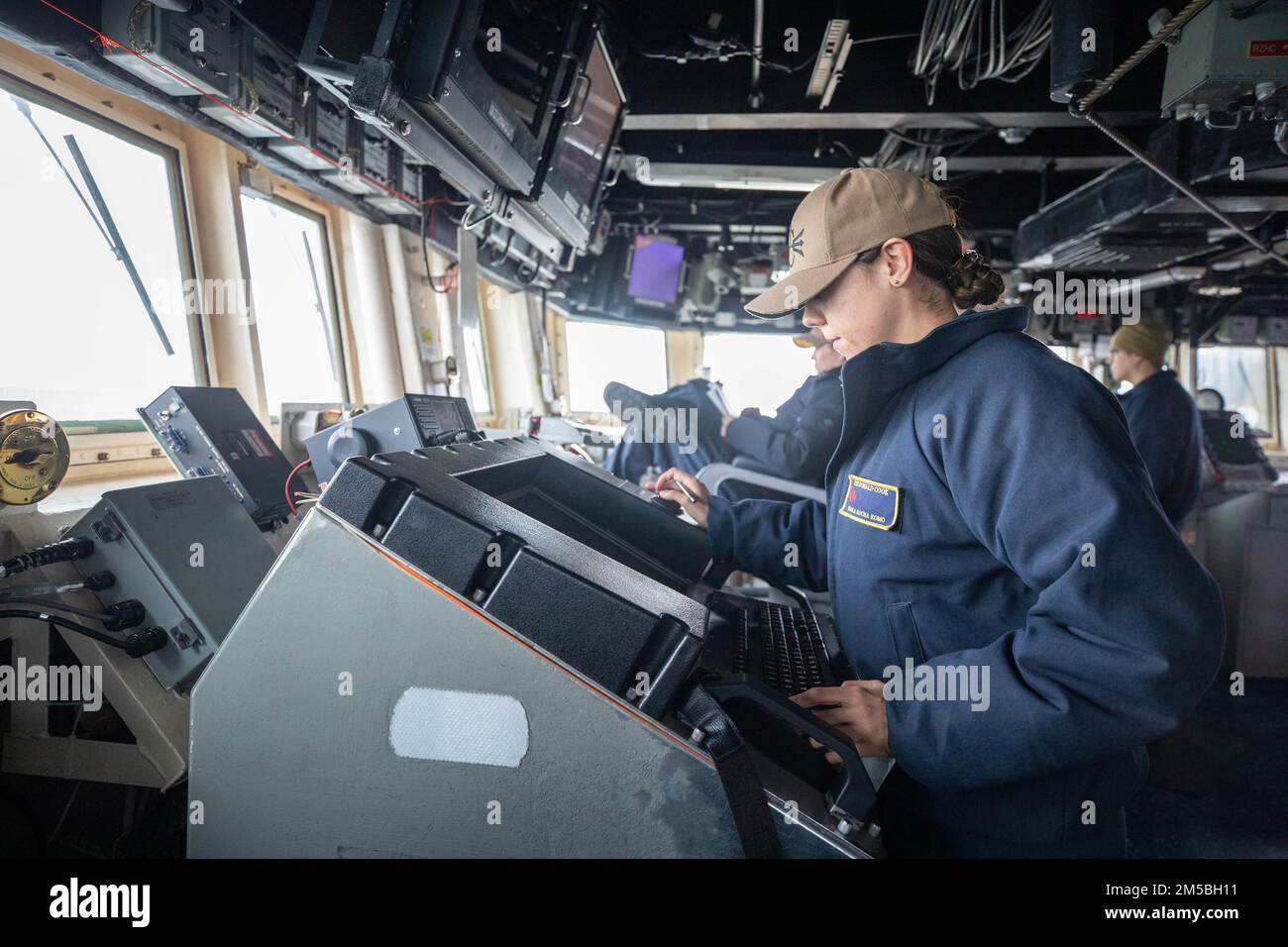 ATLANTIC OCEAN (Feb. 22, 2022) Ensign Paola Rocha Romo checks the SPS ...