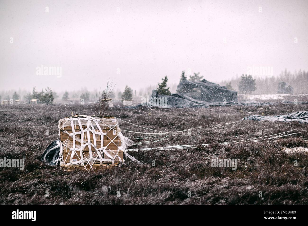 One pallet of MRE’s land on DZ Adazi in Latvia during Aerial Resupply operations conducted by ...
