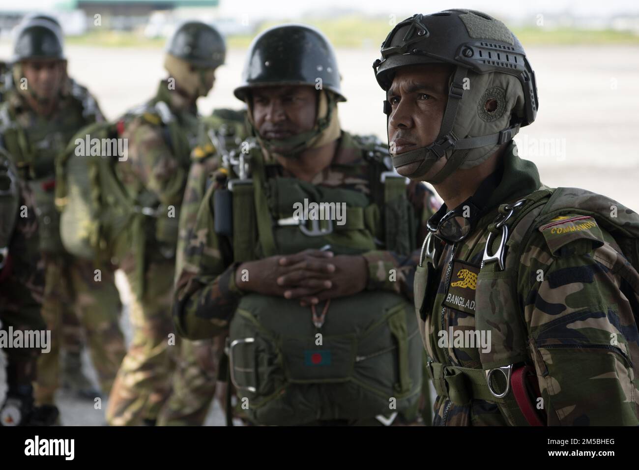 Bangladesh armed forces prepare to board a C-130J Super Hercules assigned to the 36th ...