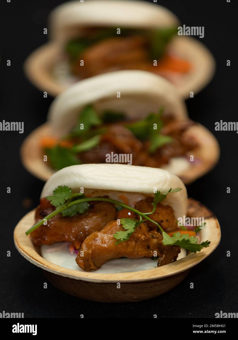 Pork Bao canapes Stock Photo - Alamy