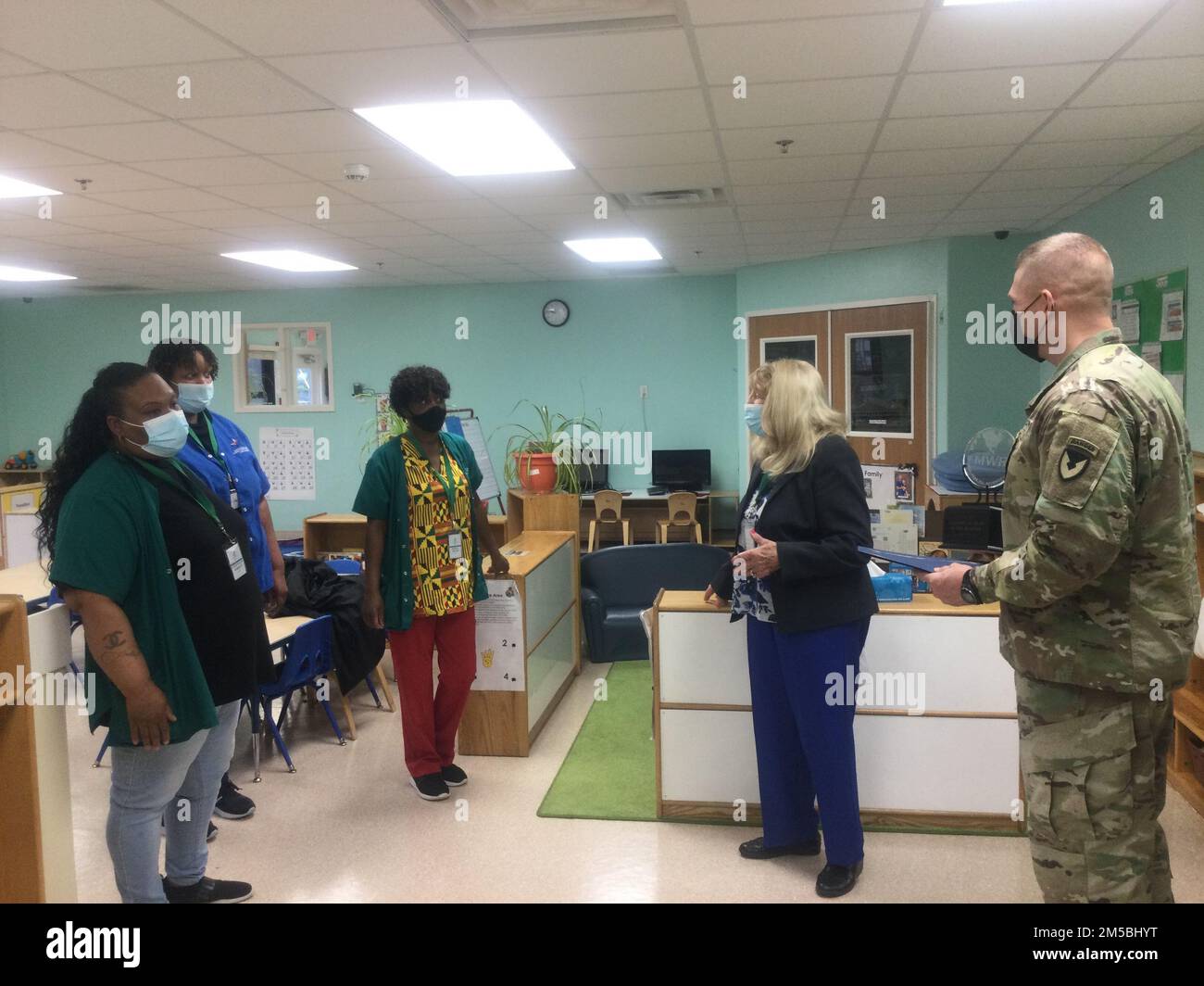 Fort Bragg Garrison Command Sgt. Maj. Jeffrey Loehr presents five staff ...