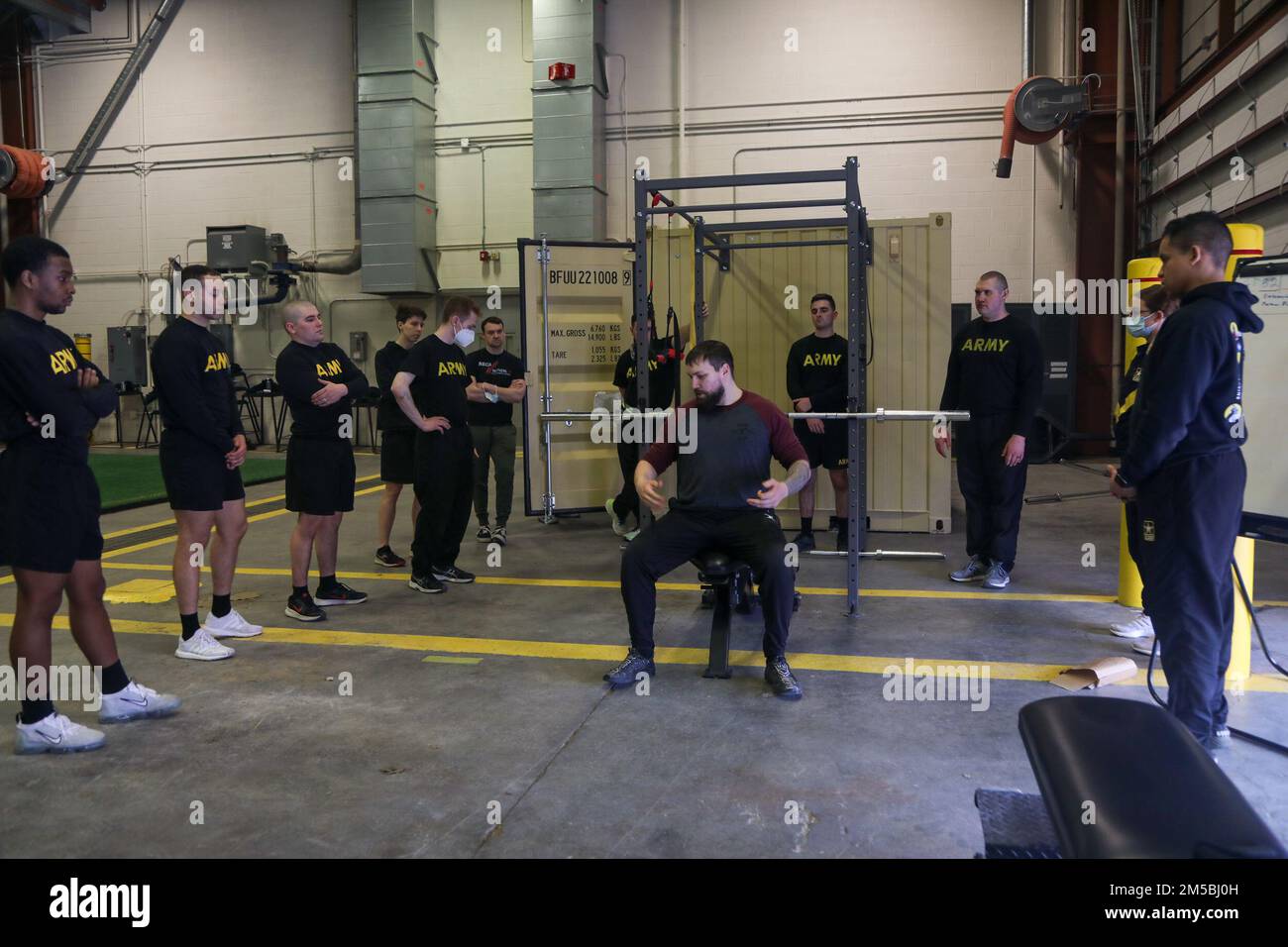 Travis Cudlin, a strength and conditioning coach with the 10th Mountain ...