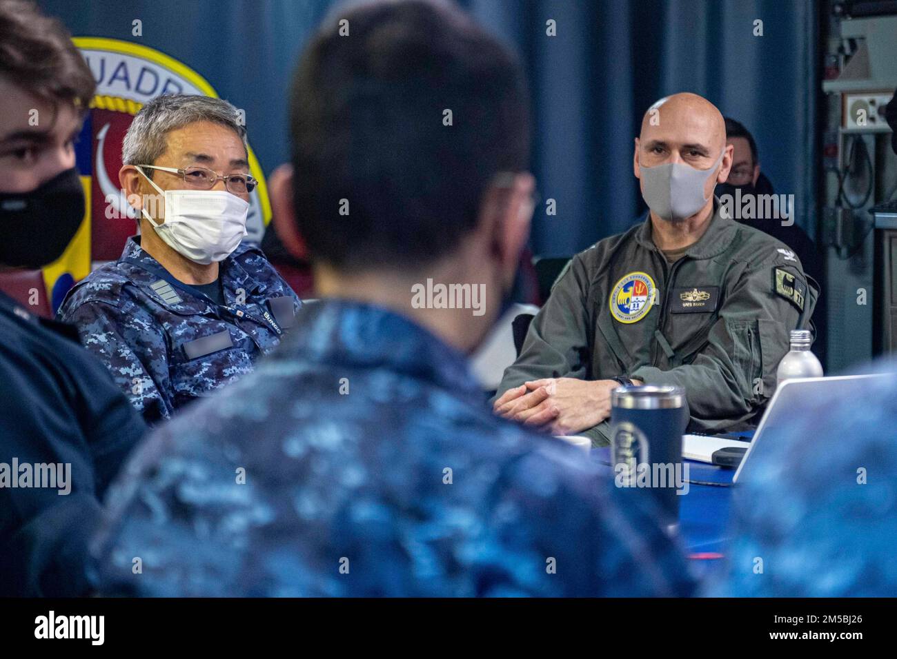 PACIFIC OCEAN (Mar. 7, 2022) Capt. Greg Baker, right, commodore of Amphibious Squadron Eleven ...