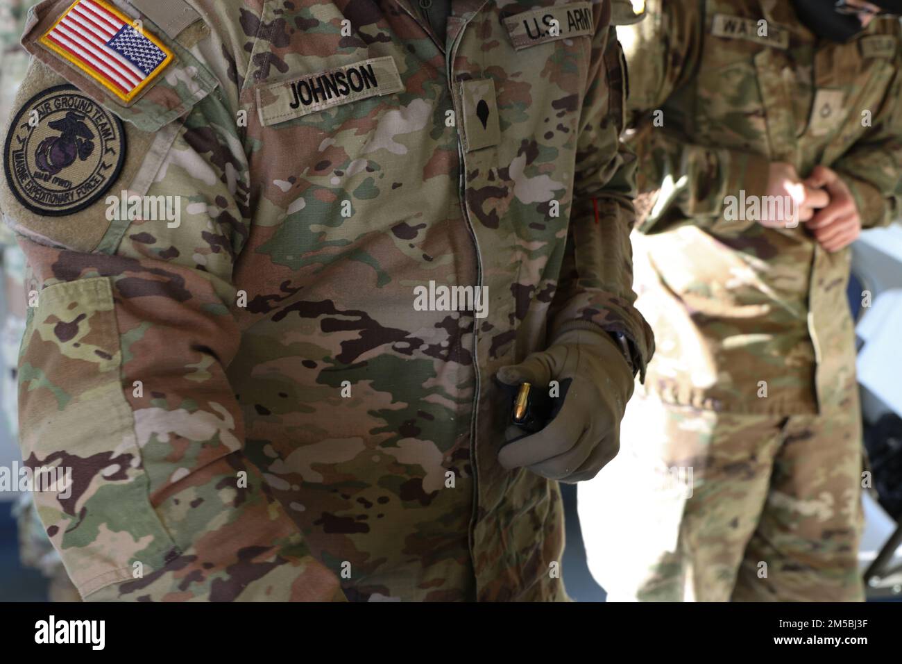 Spc. Derrick A. Johnson, a motor transport operator assigned to 3-2 ...