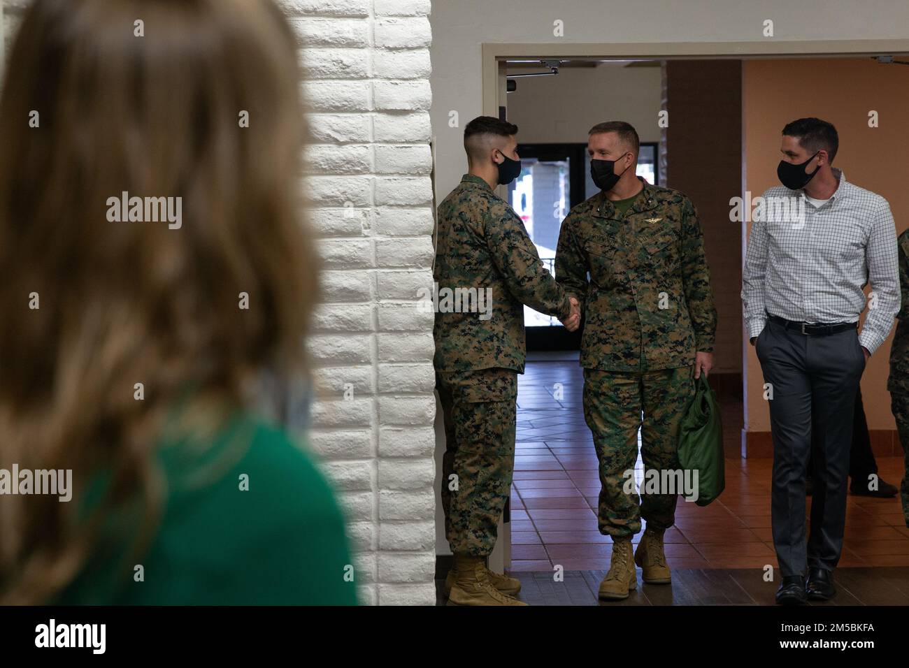 U.S. Marine Brig. Gen. Jason Woodworth, center, the commanding general ...