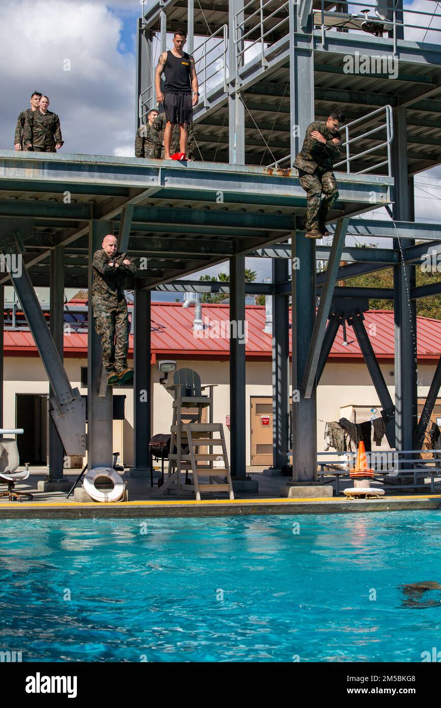 U.S. Marines with I Marine Expeditionary Force Information Group, jump ...