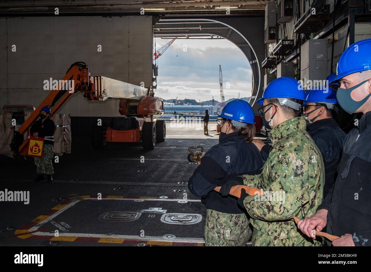 220223-N-SI601-1033 YOKOSUKA, Japan (Feb. 23, 2022) Sailors simulate ...