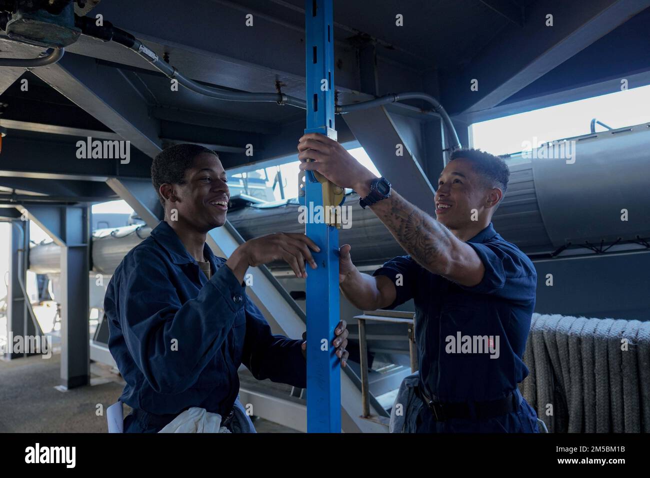 PACIFIC OCEAN (Feb. 23, 2022) Seaman Karrington Kennison, right, a ...