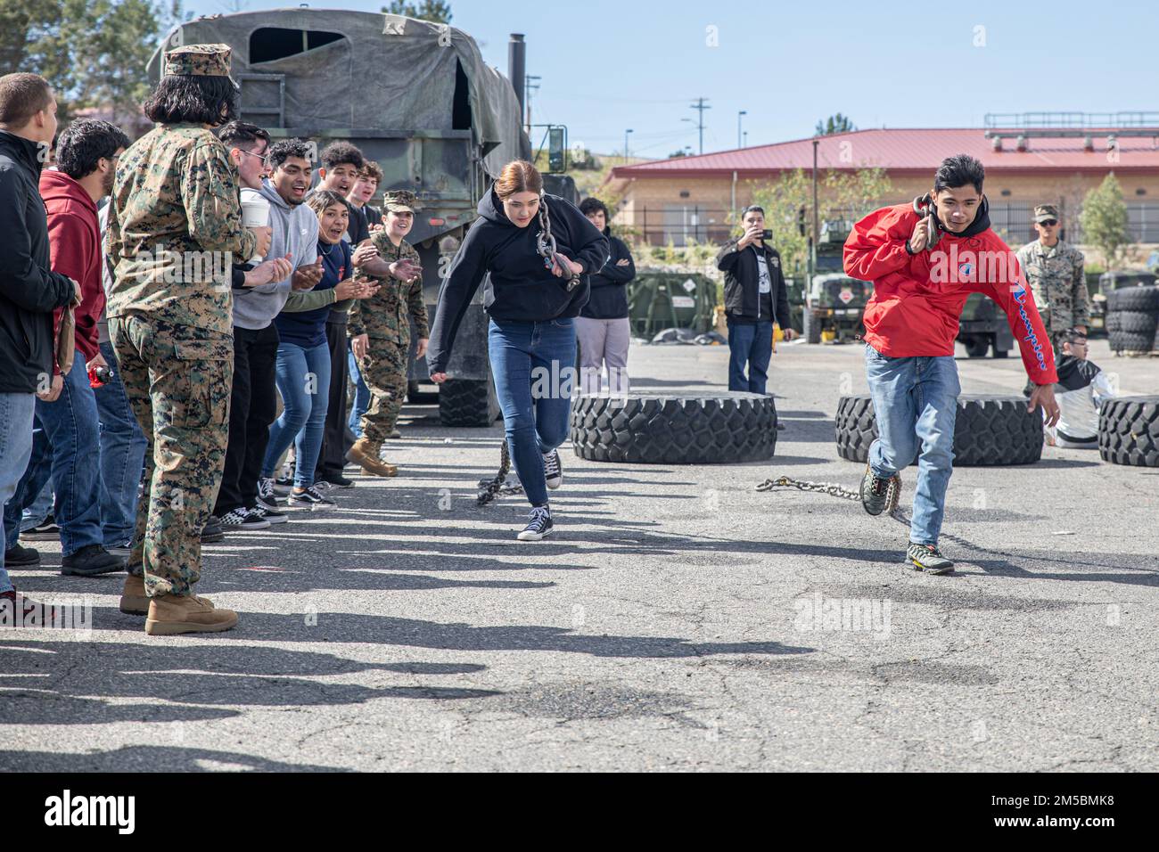 Future U.S. Marines with Recruiting Station Riverside, run with a chain ...