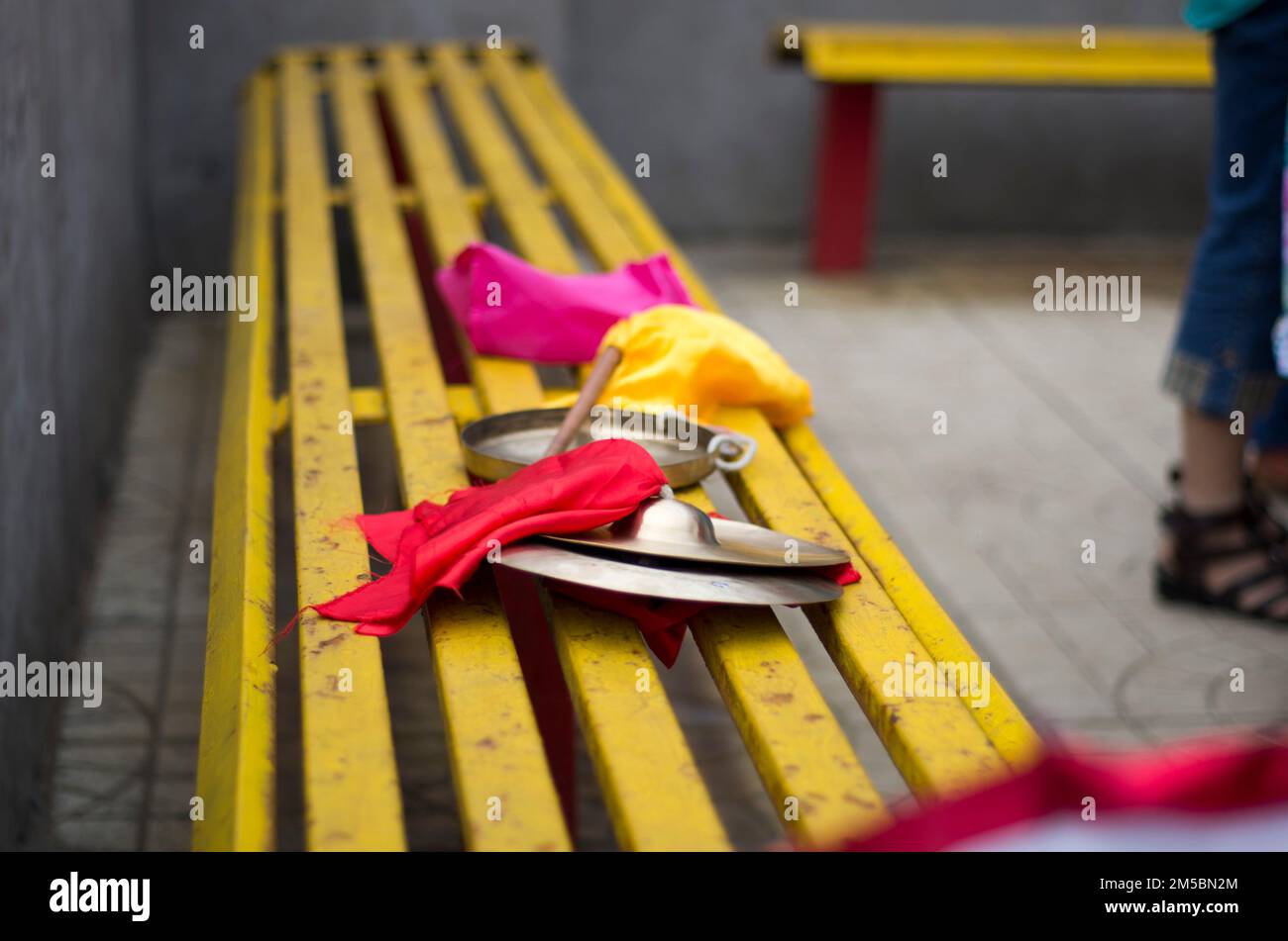 traditional music instrument on bench in a park Stock Photo - Alamy