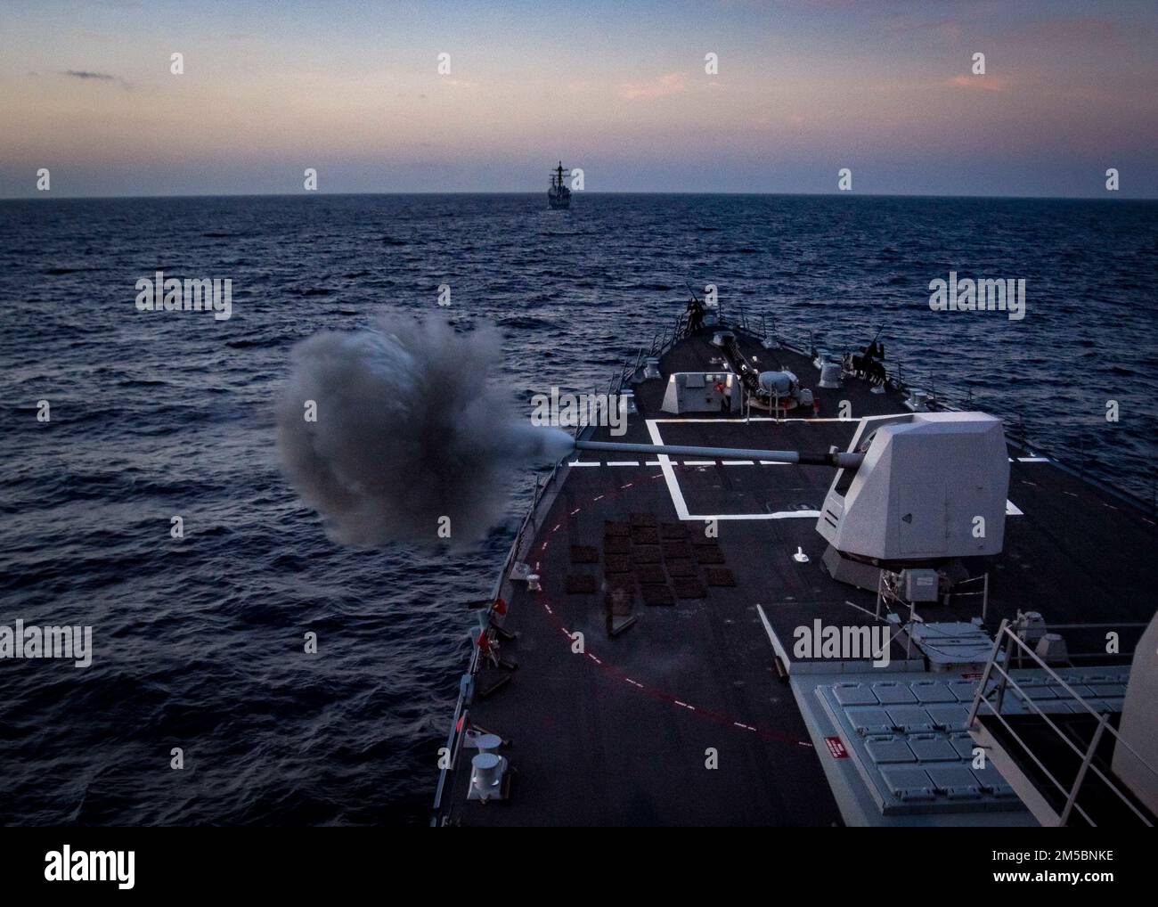 The guided-missile destroyer USS Delbert D. Black (DDG 119) fires its ...