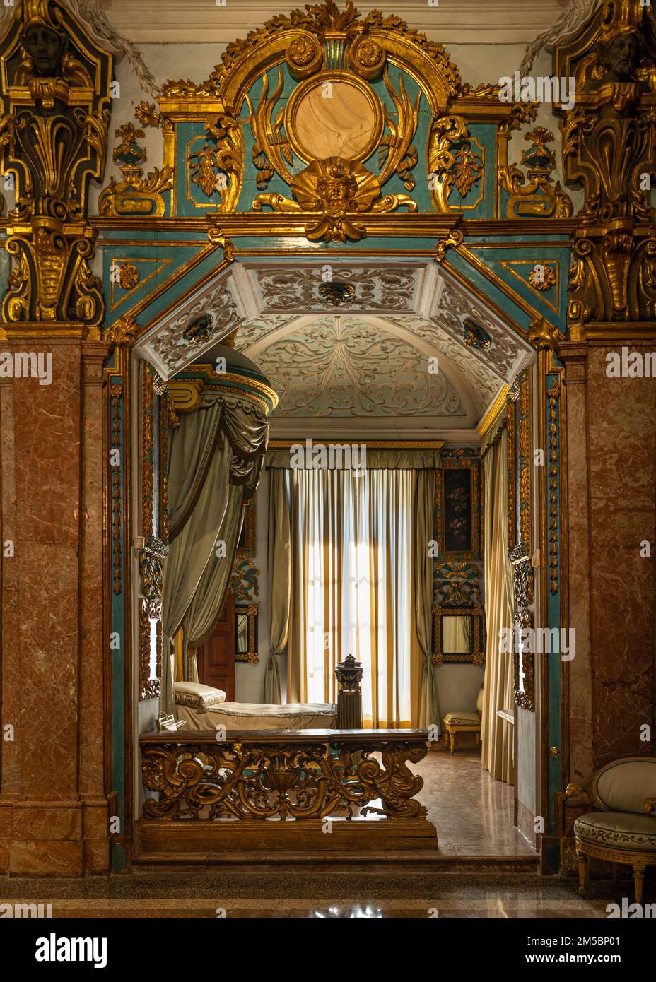 A vertical shot of Luxury interiors of Borromeo palace, a baroque style ...