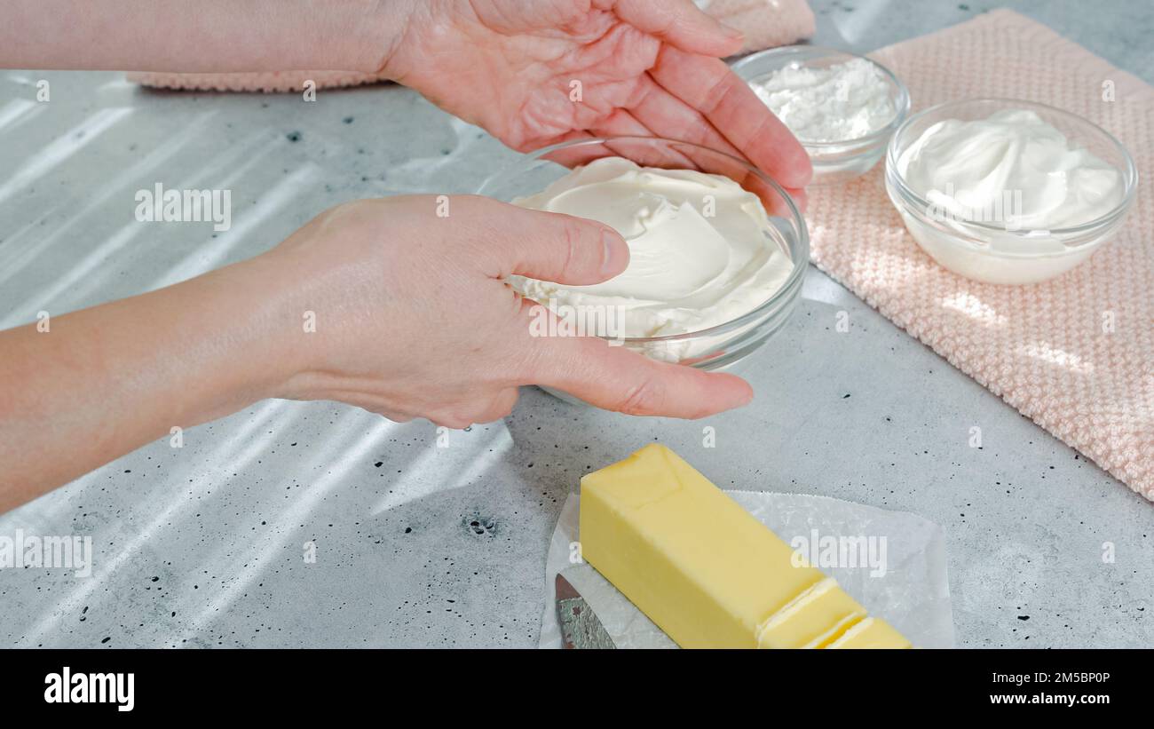 Cheesecake recipe. Ingredients close-up on the kitchen table. Cream ...