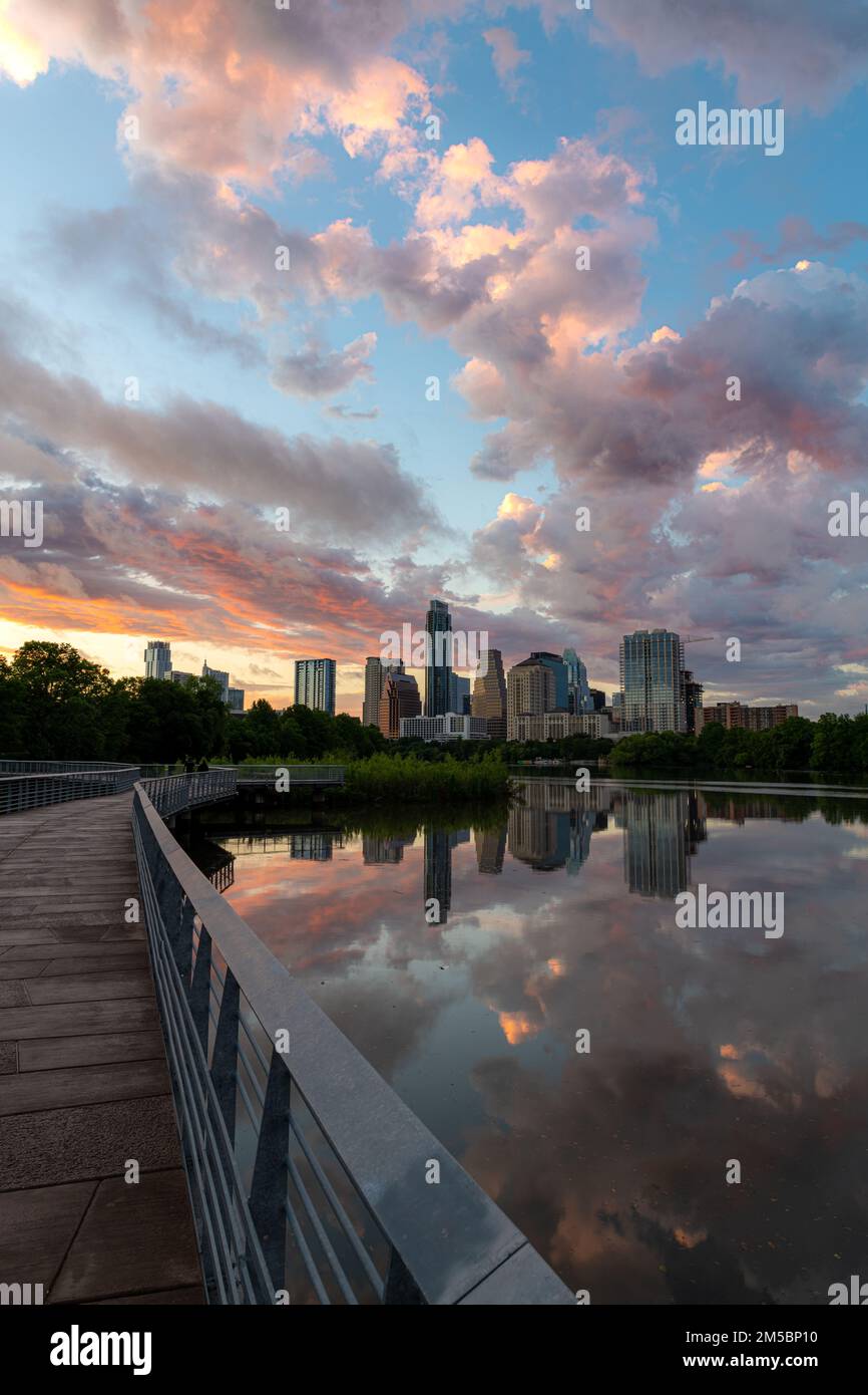 A vertical shot of TX skyline at sunset from the boardwalk along Town ...