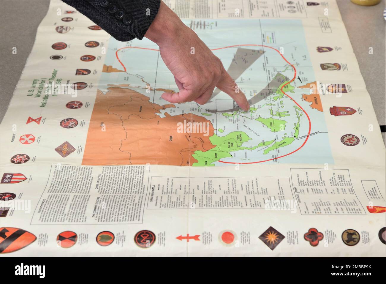 Ward Zischke, 88th Readiness Division historian, points to the U.S ...