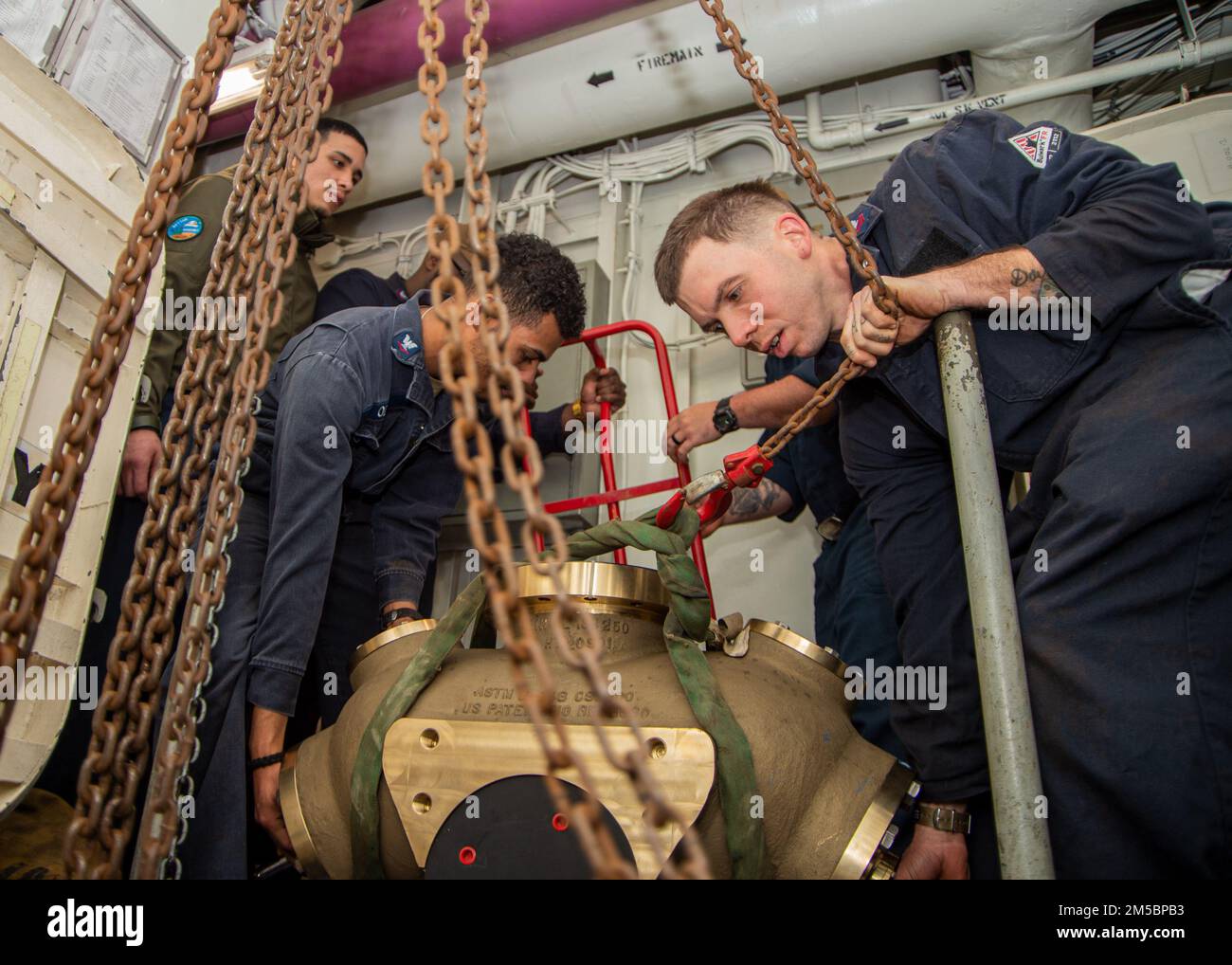 220224-N-JR318-1020 ADRIATIC SEA (Feb. 24, 2022) Sailors hoist a hellan ...