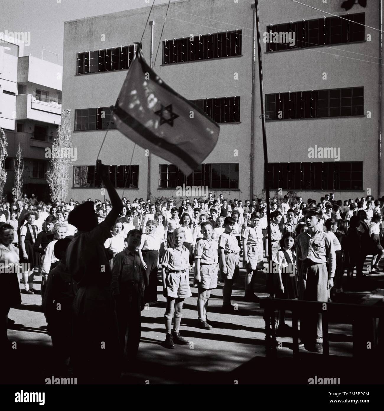 A Jewish flag raising ceremony et a primary schoo in Tel Aviv Stock ...