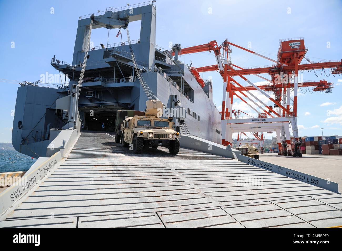 Military vehicles originating from the 402nd Army Field Support ...