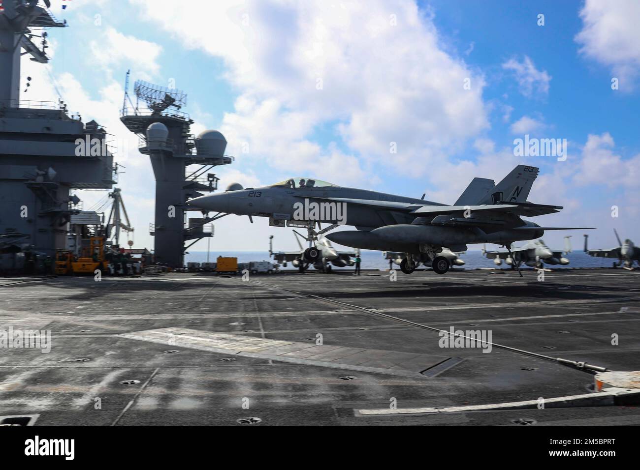 PHILIPPINE SEA (Feb. 24, 2022) Rear Admiral J.T. Anderson, commander, Carrier Strike Group 3 ...