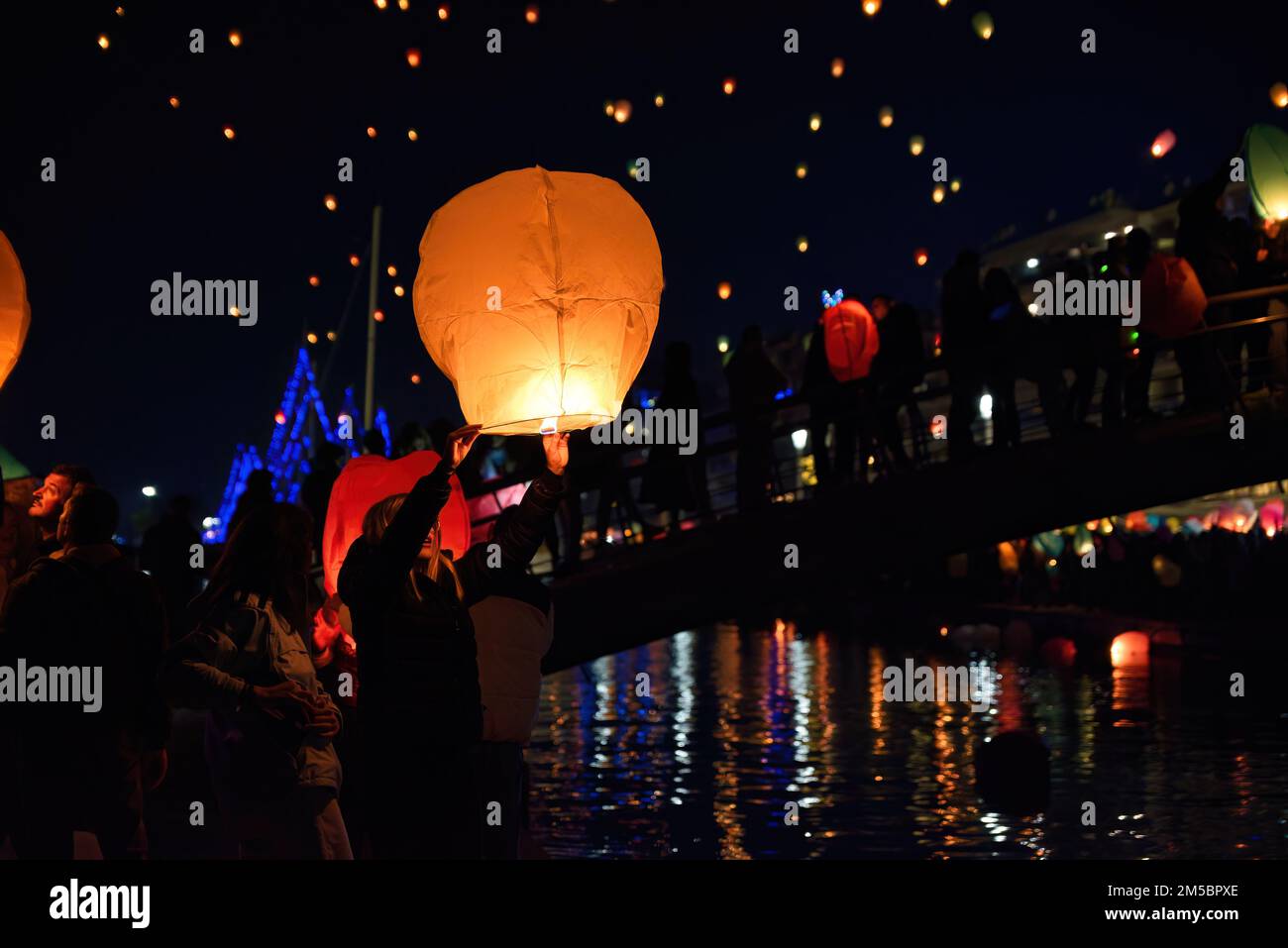 Sky lanterns floating in the sky. Volos lights festival. colorful ...
