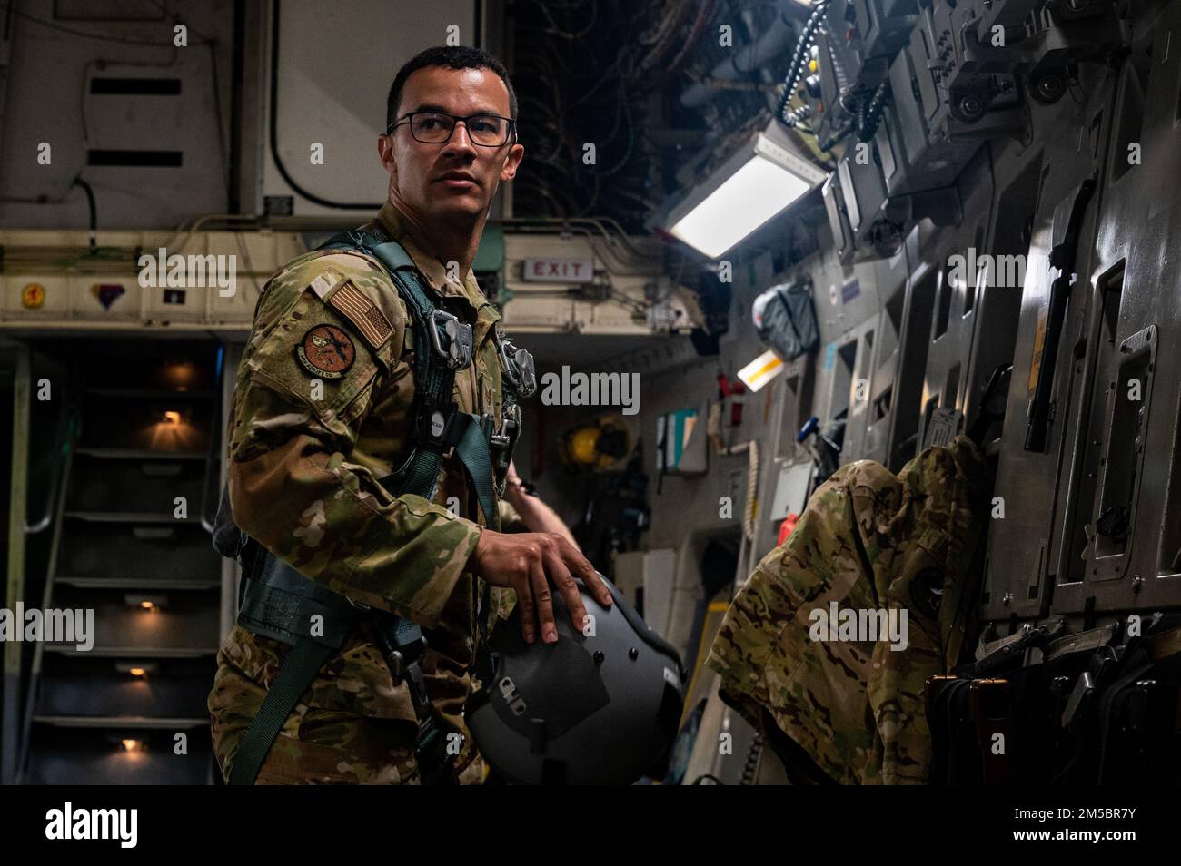 Tech. Sgt. Nelson Jones, 14th Airlift Squadron loadmaster, prepares his ...