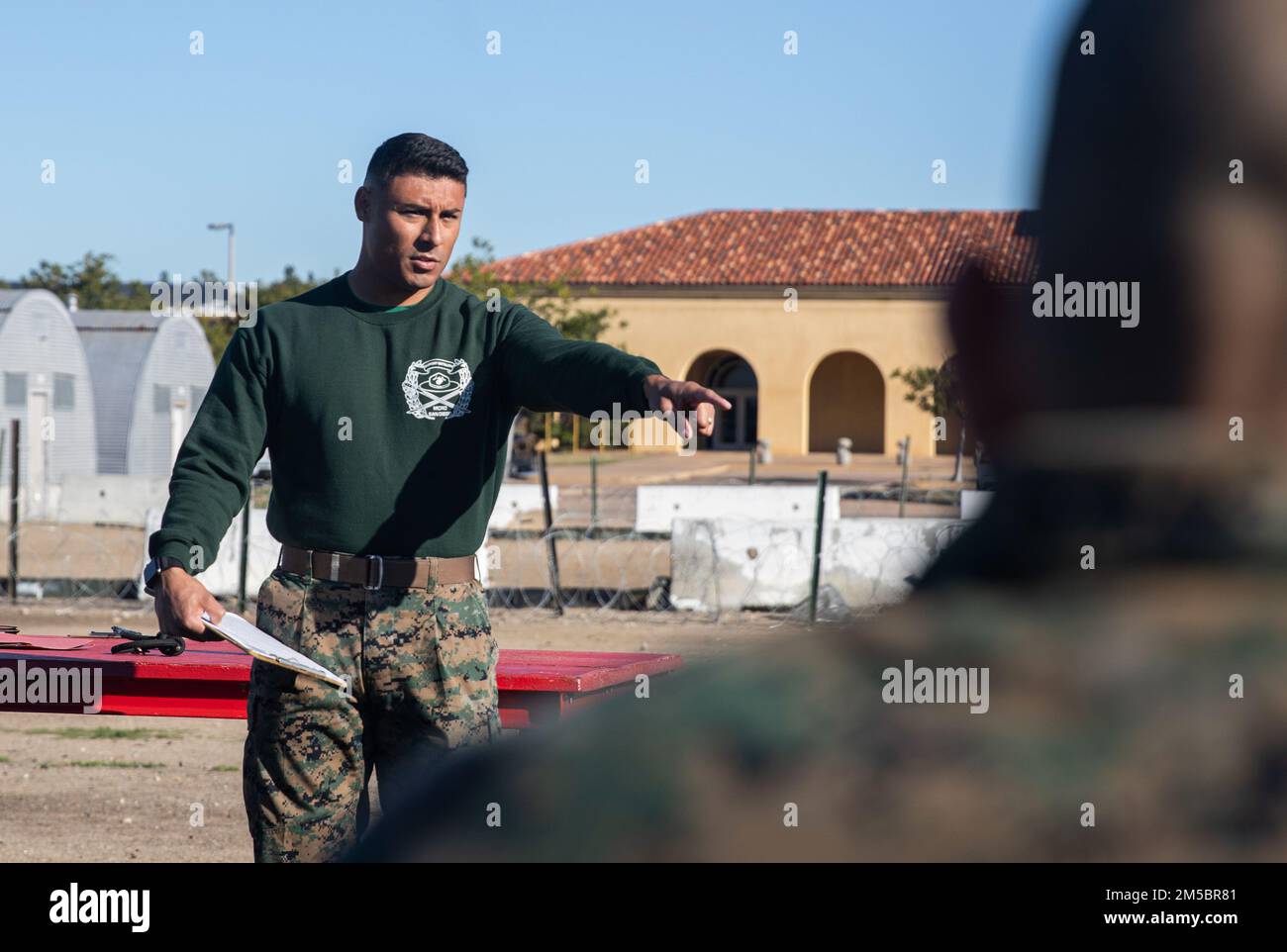 U.S. Marine Corps Drill Instructor Staff Sgt. Carlos A. Nunez instructs ...
