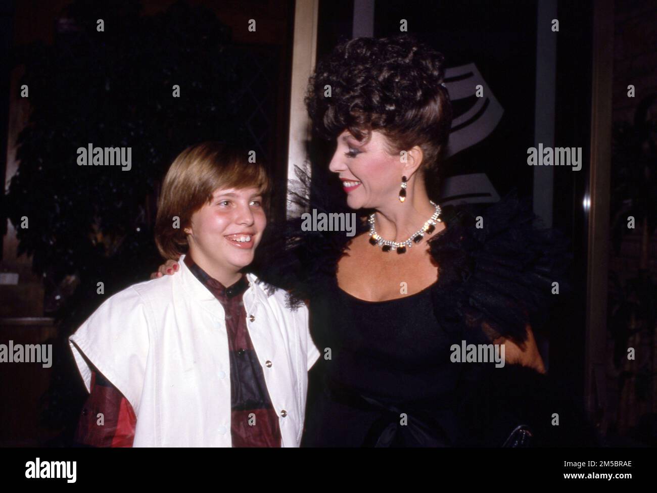 Katyana Kass and Joan Collins Circa 1980's Credit: Ralph Dominguez/MediaPunch Stock Photo - Alamy