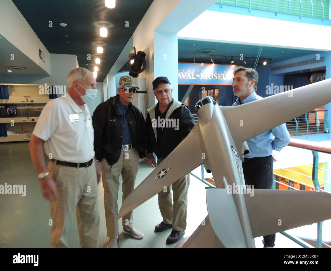 Russ Martin, a museum volunteer, shows a detailed model of an A-6 ...