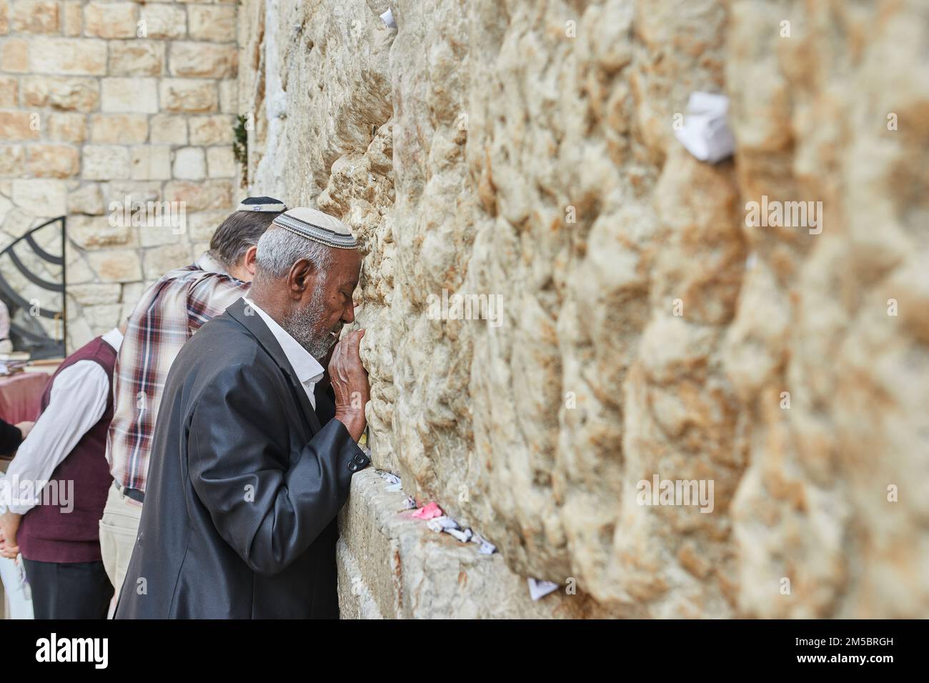 View of the Wailing Wall with worshipers, the shrine of the Jewish ...