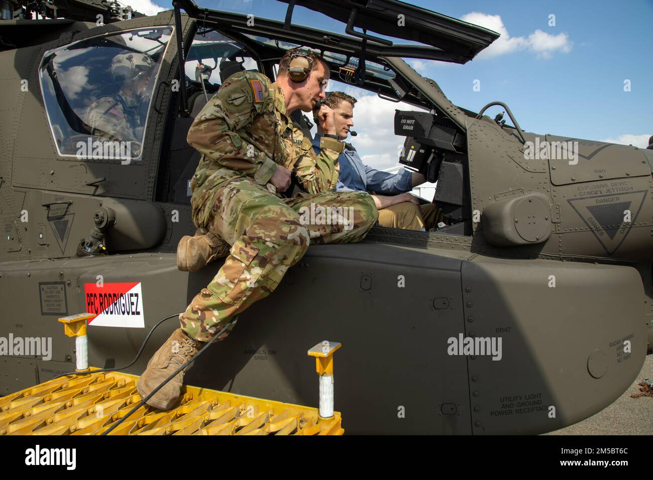 Chief Warrant Officer 2 Jamie Benson, an AH-64E Apache helicopter pilot ...